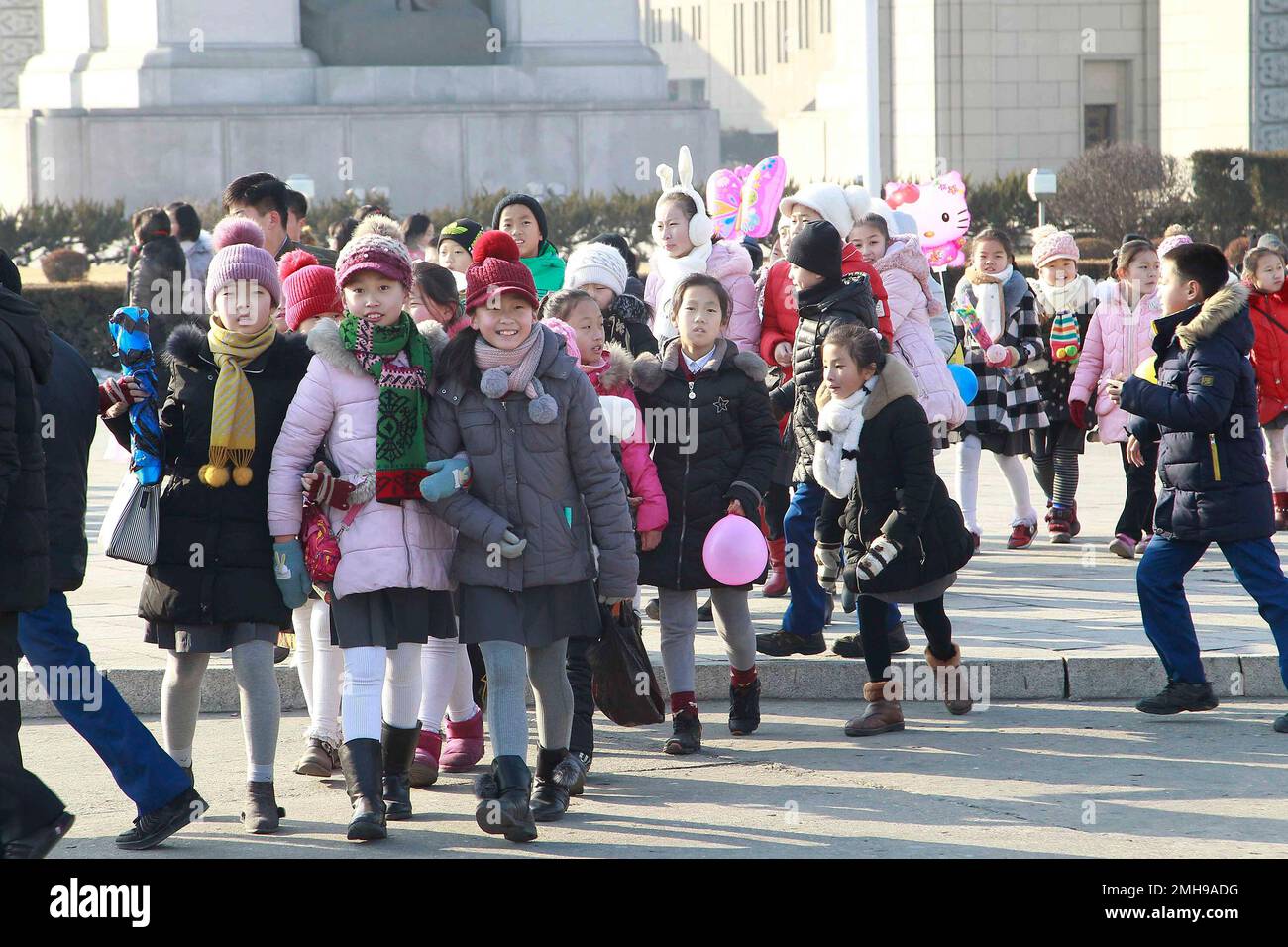 Students head to play folk games at the square of Arch of Triumph in ...