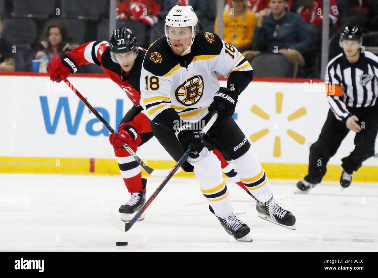 New Jersey Devils center Pavel Zacha (37) chases Boston Bruins right ...