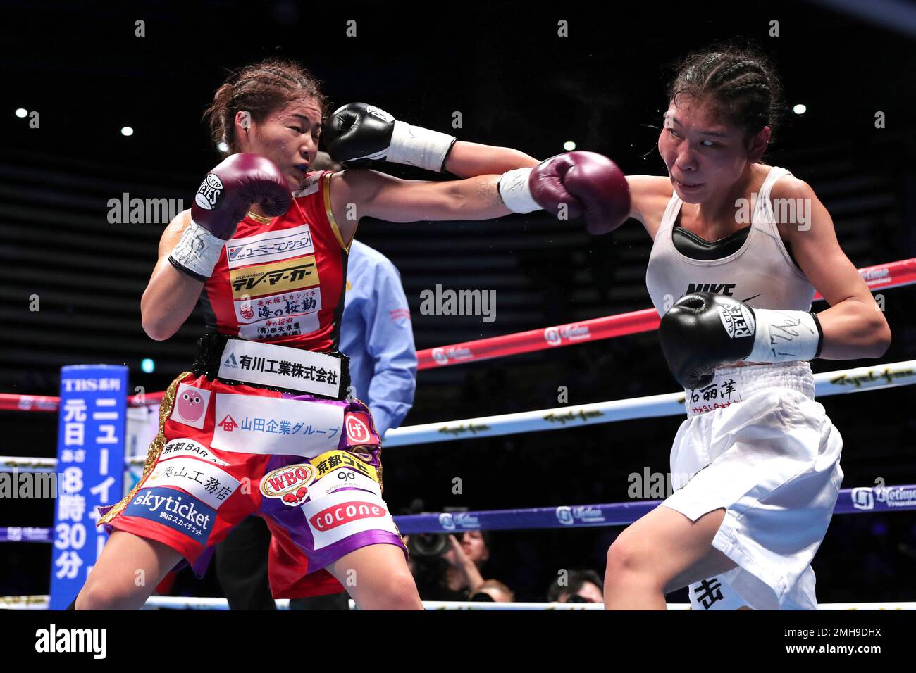 Japanese champion Miyo Yoshida, left, and Chinese challenger Shi Liping ...
