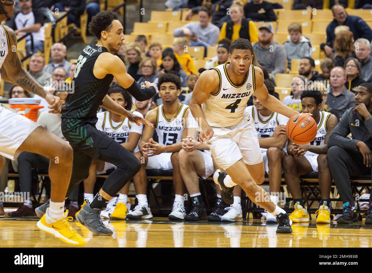 Missouri's Javon Pickett, right, dribbles around Chicago State's Jace ...