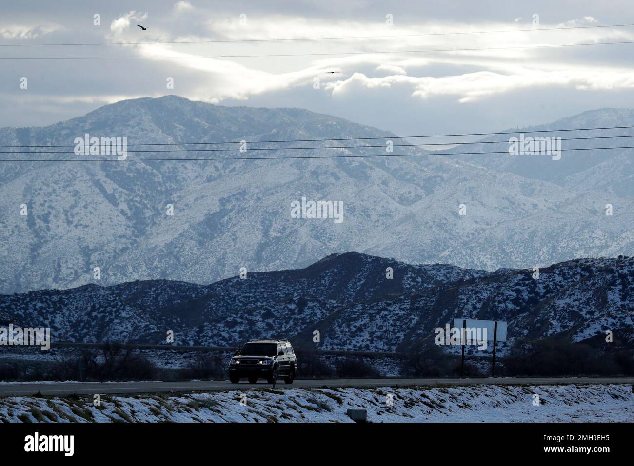 A motorist makes their way along state Highway 138 after a series of ...