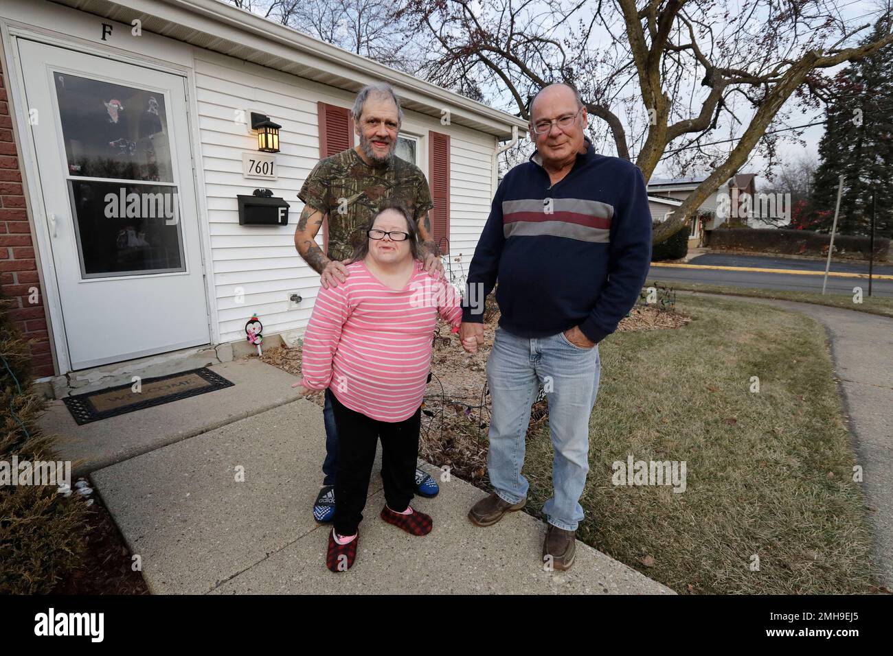 In this Friday, Dec. 20, 2019 photo, Tyrone Cefalu, right, Bobby ...