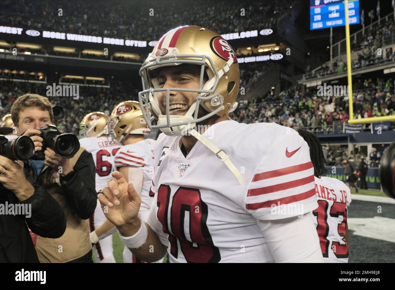 San Francisco 49ers quarterback Jimmy Garoppolo reacts after the team ...