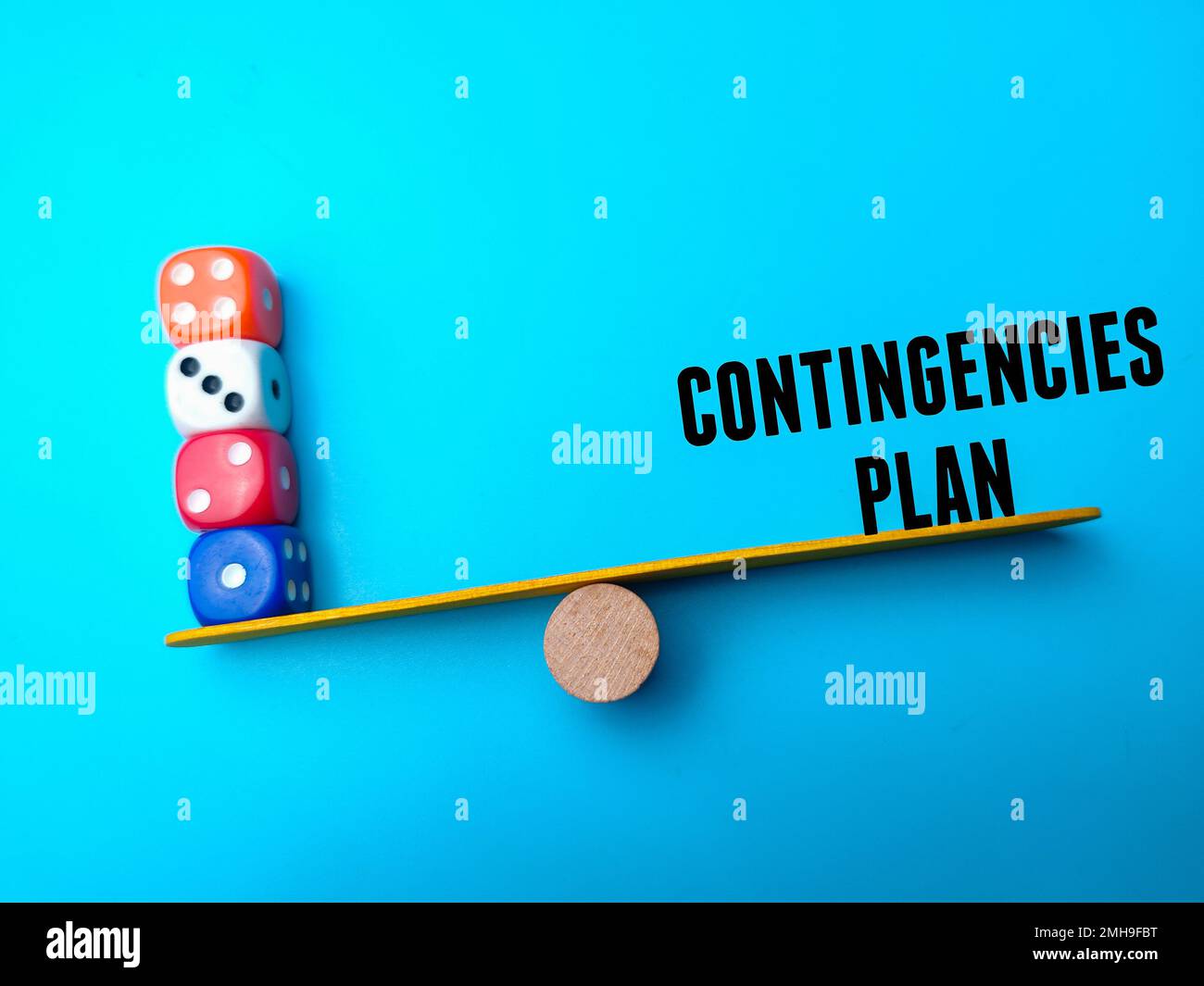 Colored dice with the word CONTINGENCIES PLAN Stock Photo - Alamy