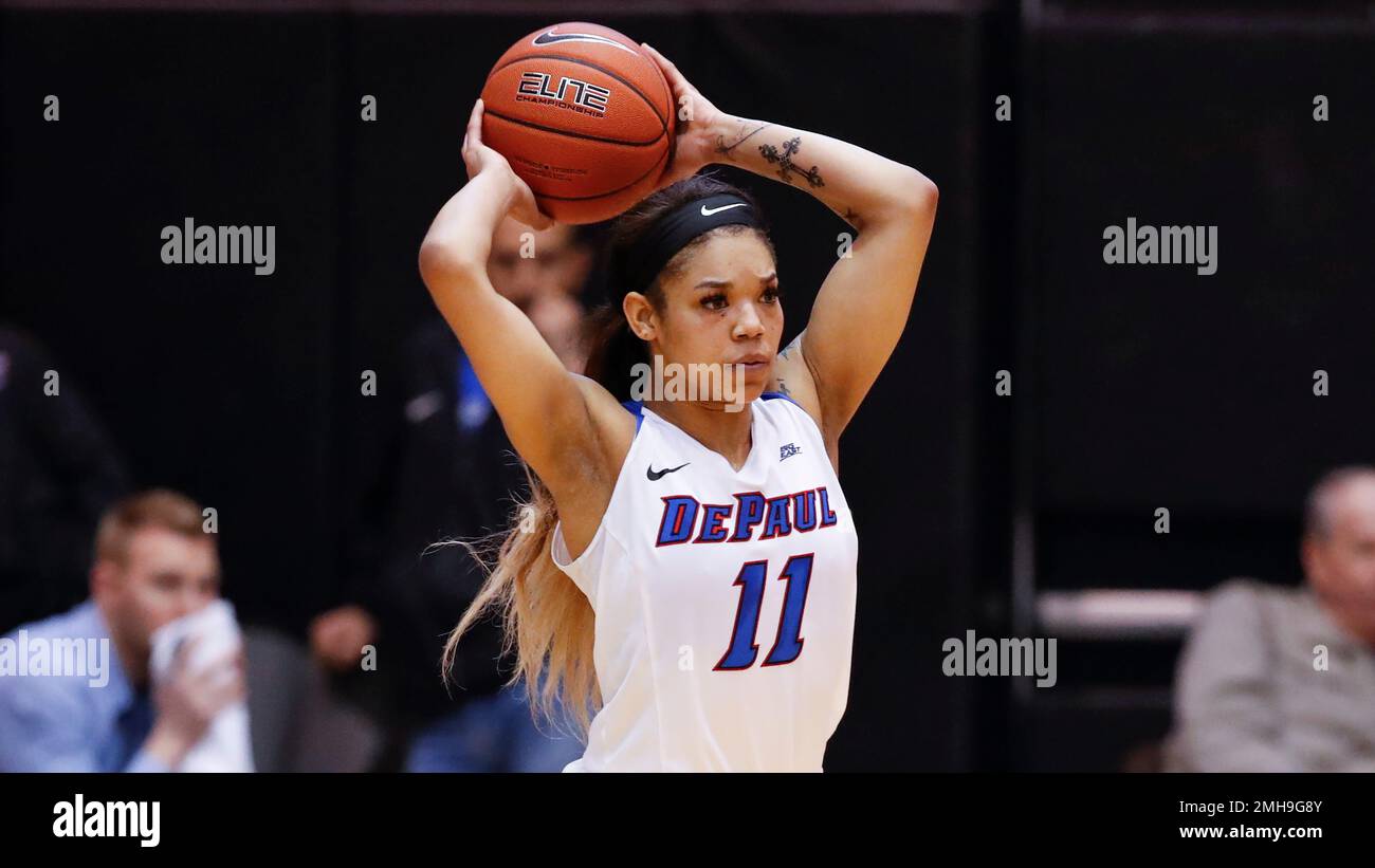 DePaul guard Sonya Morris looks to pass the ball against Marquette ...