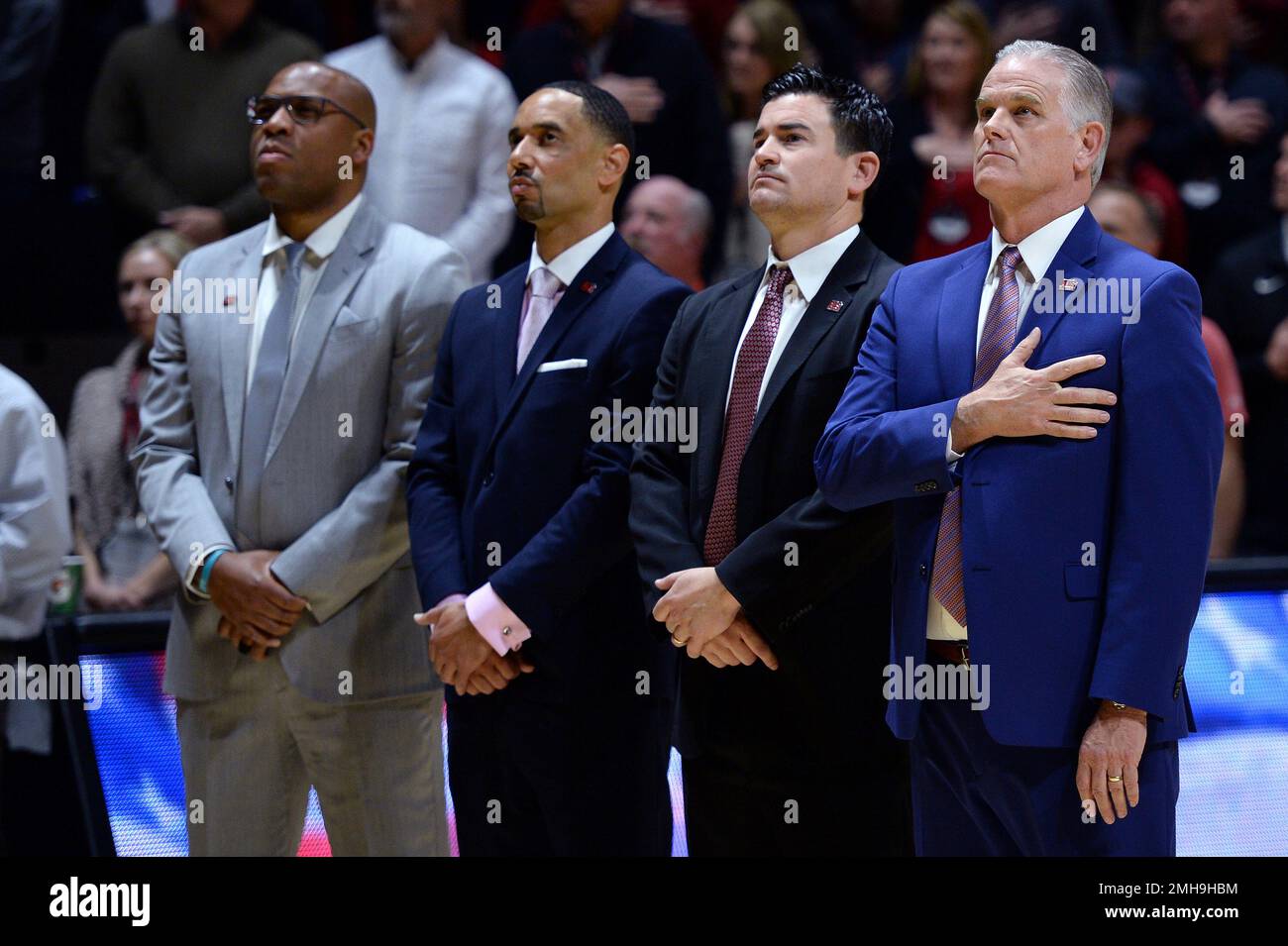 San Diego State coaches, from right to left, Brian Dutcher, David ...