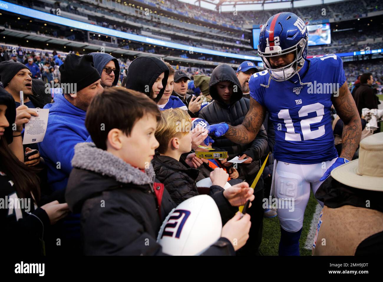 New York Giants wide receiver Cody Latimer (12) signs autographs before ...