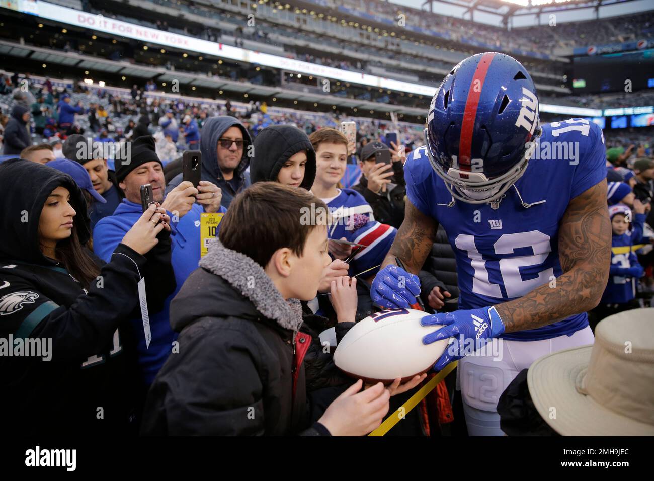 New York Giants wide receiver Cody Latimer (12) signs autographs before ...