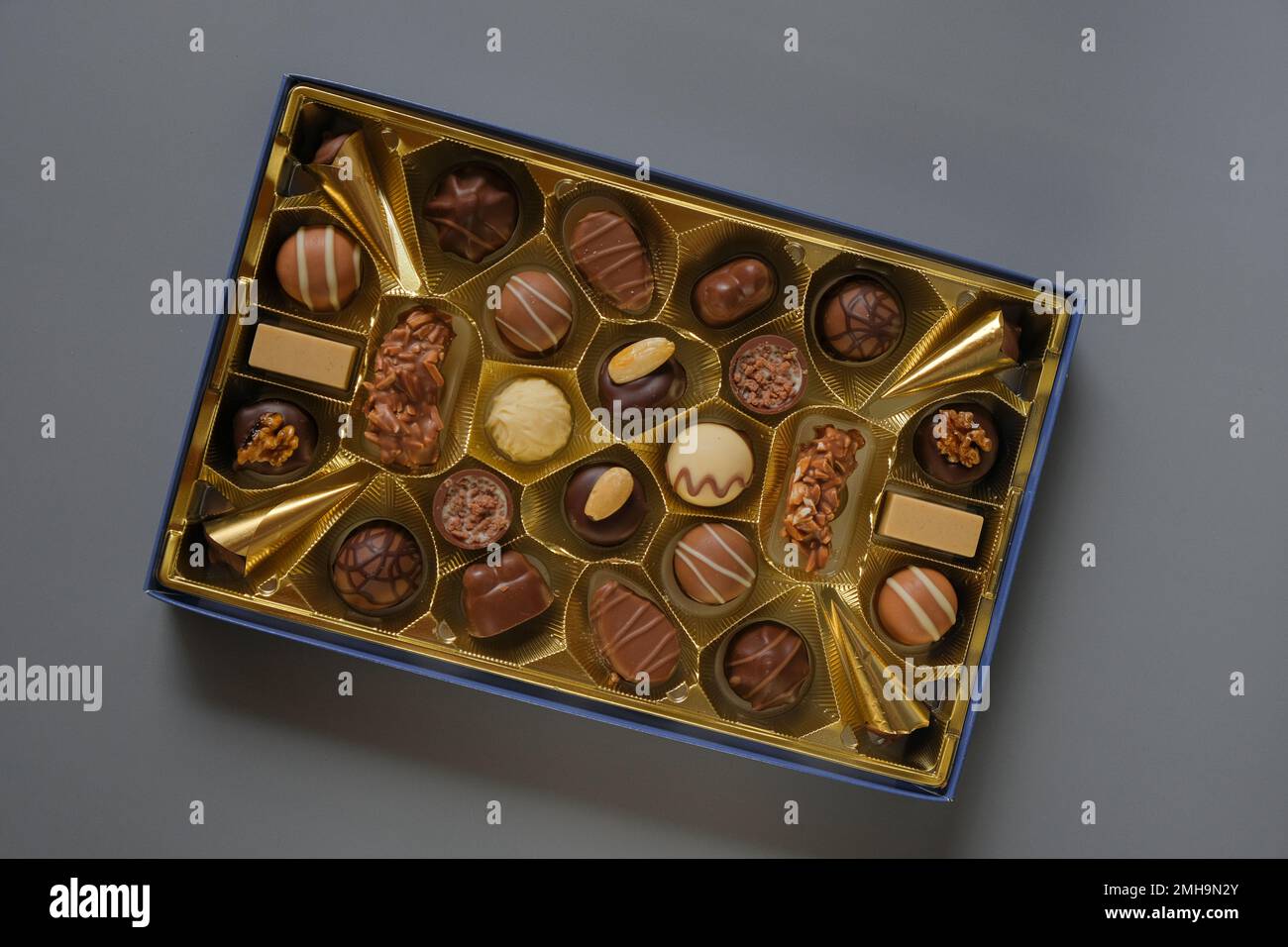 Milk chocolate candy.Sweets and desserts. Assorted chocolate candies in ...