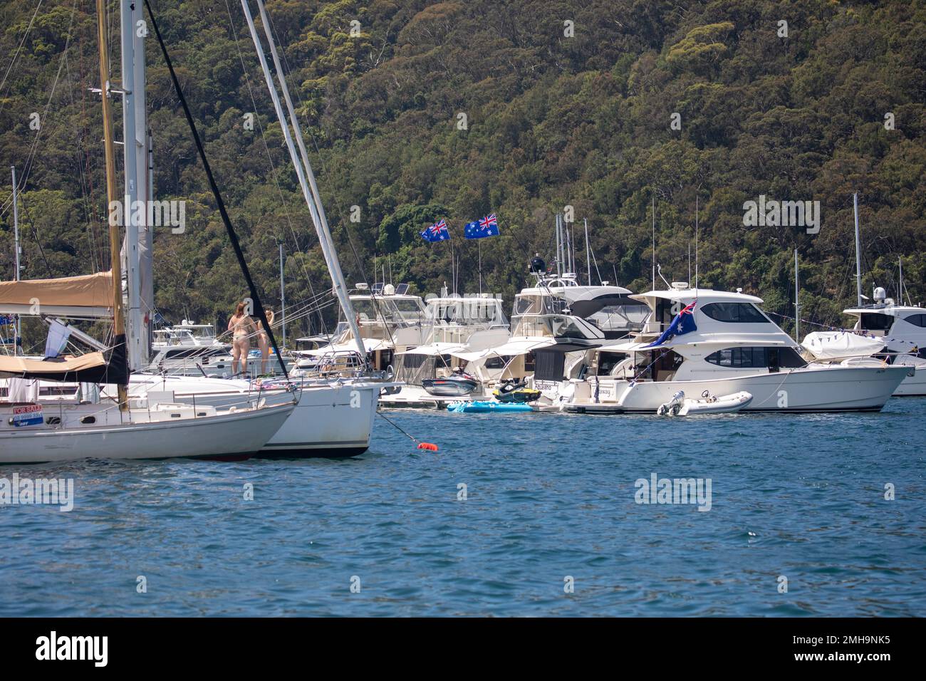 Luxury motor cruiser yachts rafted up on Pittwater Sydney on Australia ...
