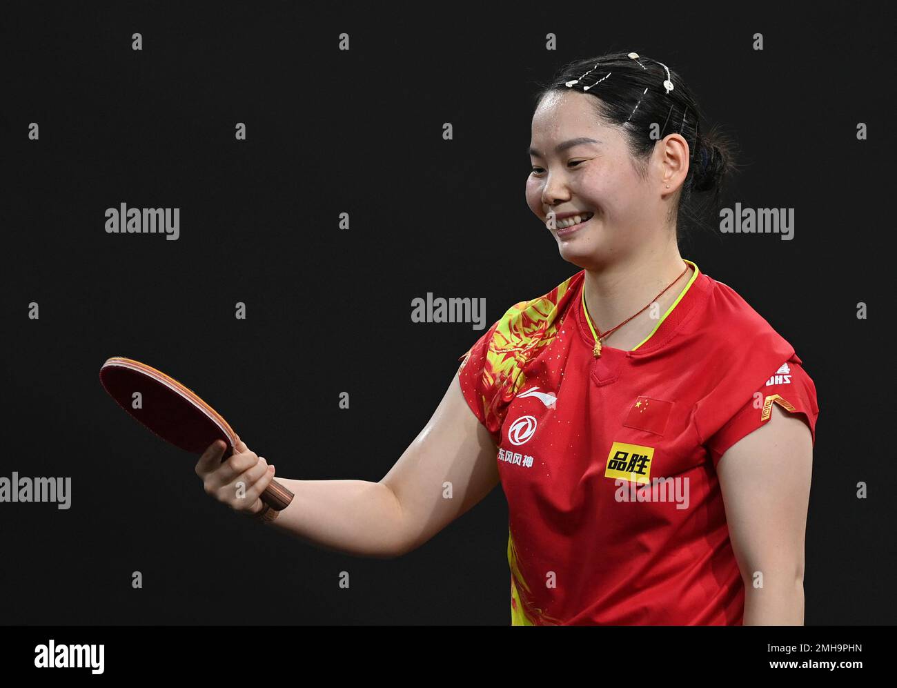 Doha, Qatar. 26th Jan, 2023. He Zhuojia of China reacts during the ...