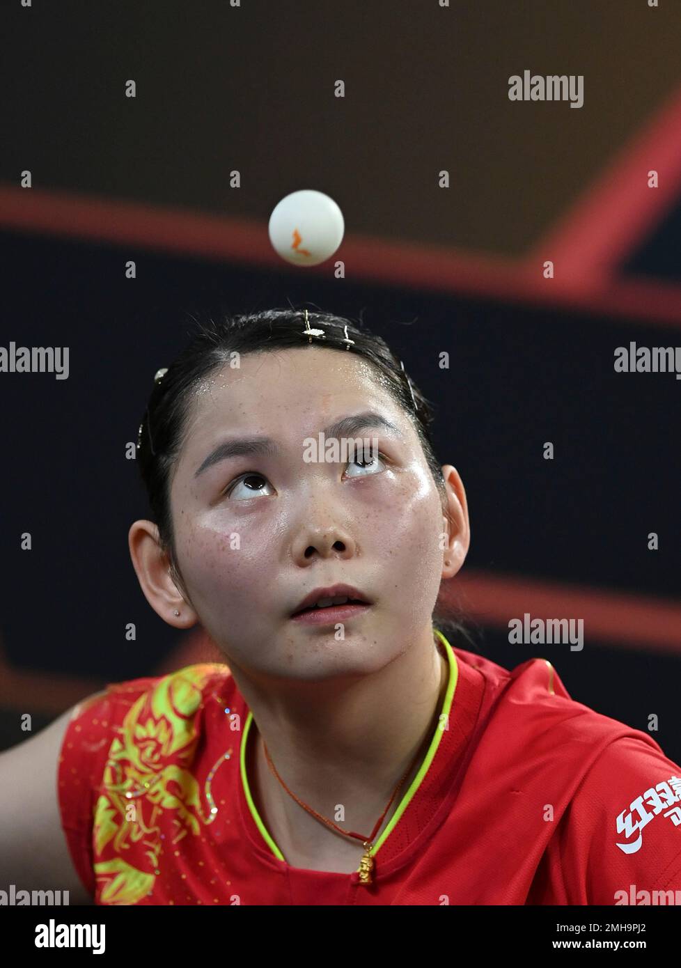 Doha, Qatar. 26th Jan, 2023. He Zhuojia of China serves during the ...