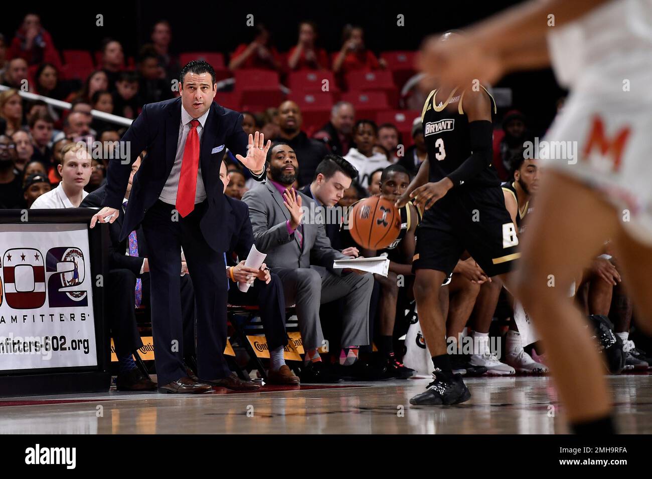 Bryant University head coach Jared Grasso directs his team during the ...