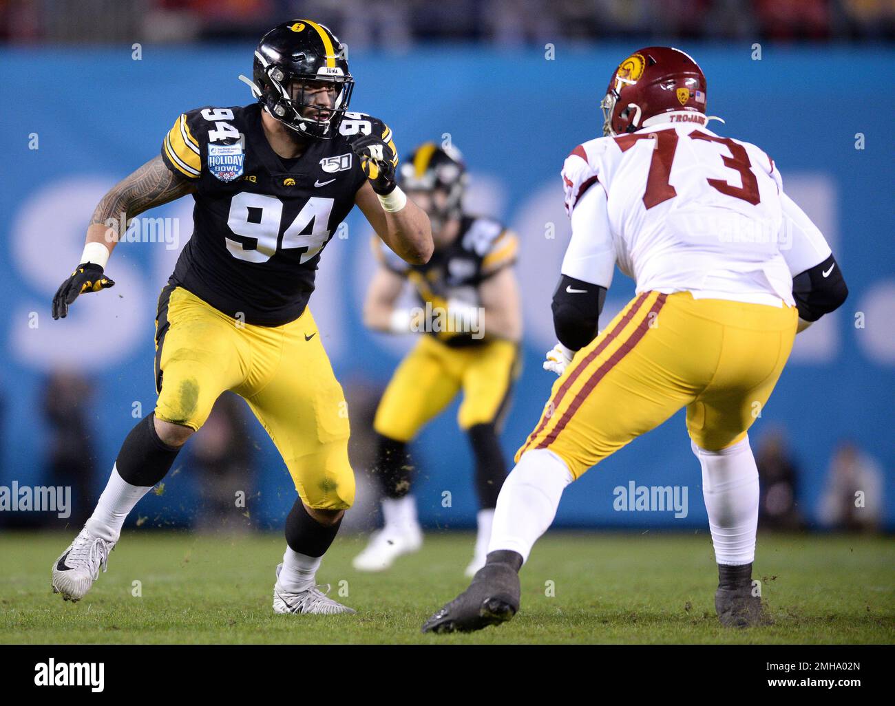 Iowa defensive end A.J. Epenesa (94) works against Southern California ...