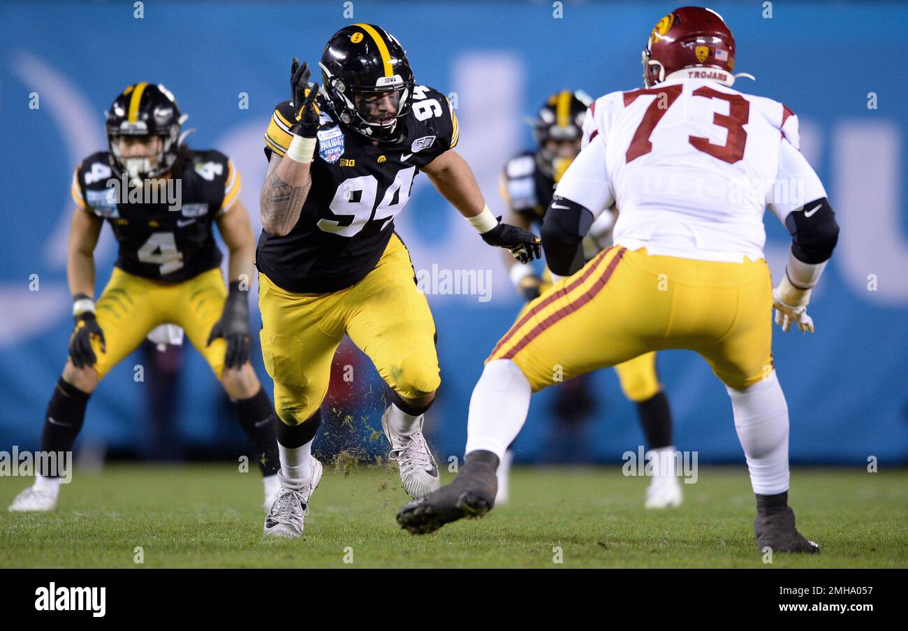 Iowa defensive end A.J. Epenesa (94) works against Southern California ...