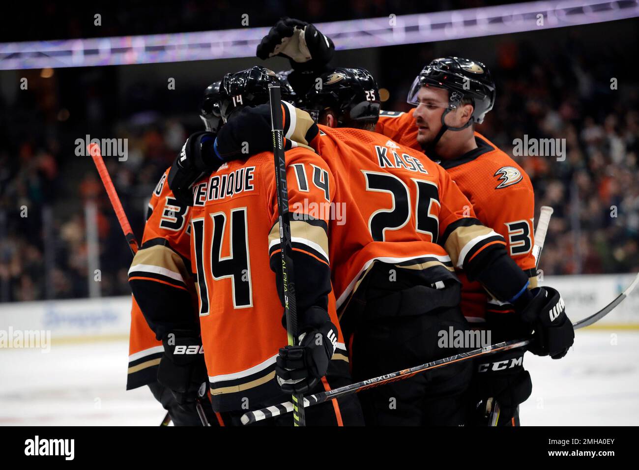 Anaheim Ducks' Adam Henrique (14) celebrates his goal with teammates ...