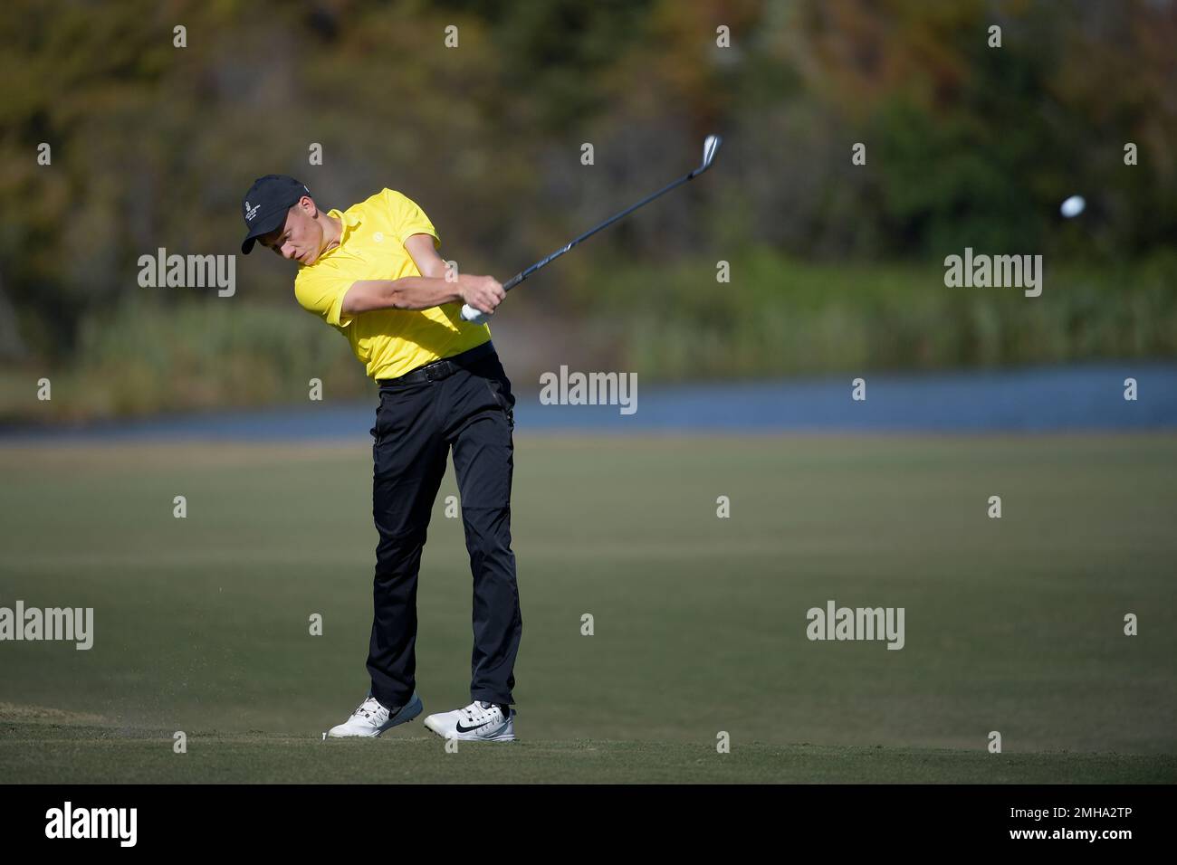 Jason Donald Langer, son of Bernhard Langer, hits from the 18th fairway ...