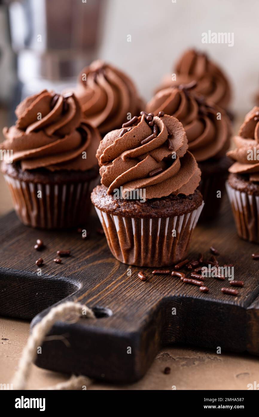 Dark chocolate cupcakes with chocolate ganache frosting Stock Photo - Alamy
