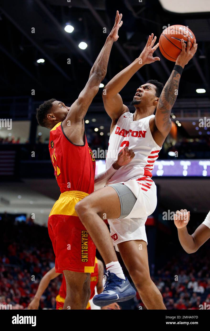 Dayton guard Ibi Watson (2) puts up a shot against Grambling State ...