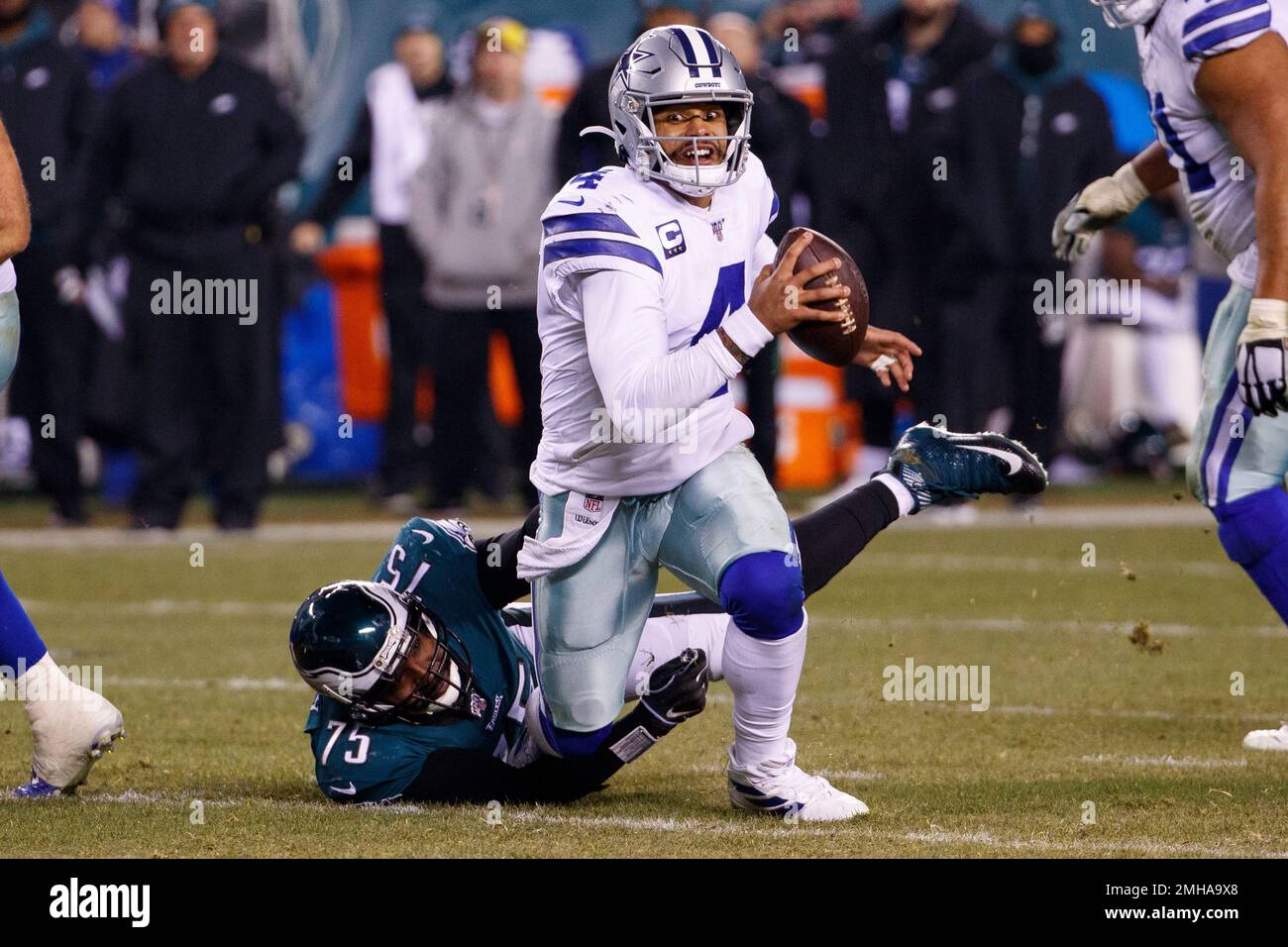Dallas Cowboys quarterback Dak Prescott (4) scrambles with Philadelphia ...