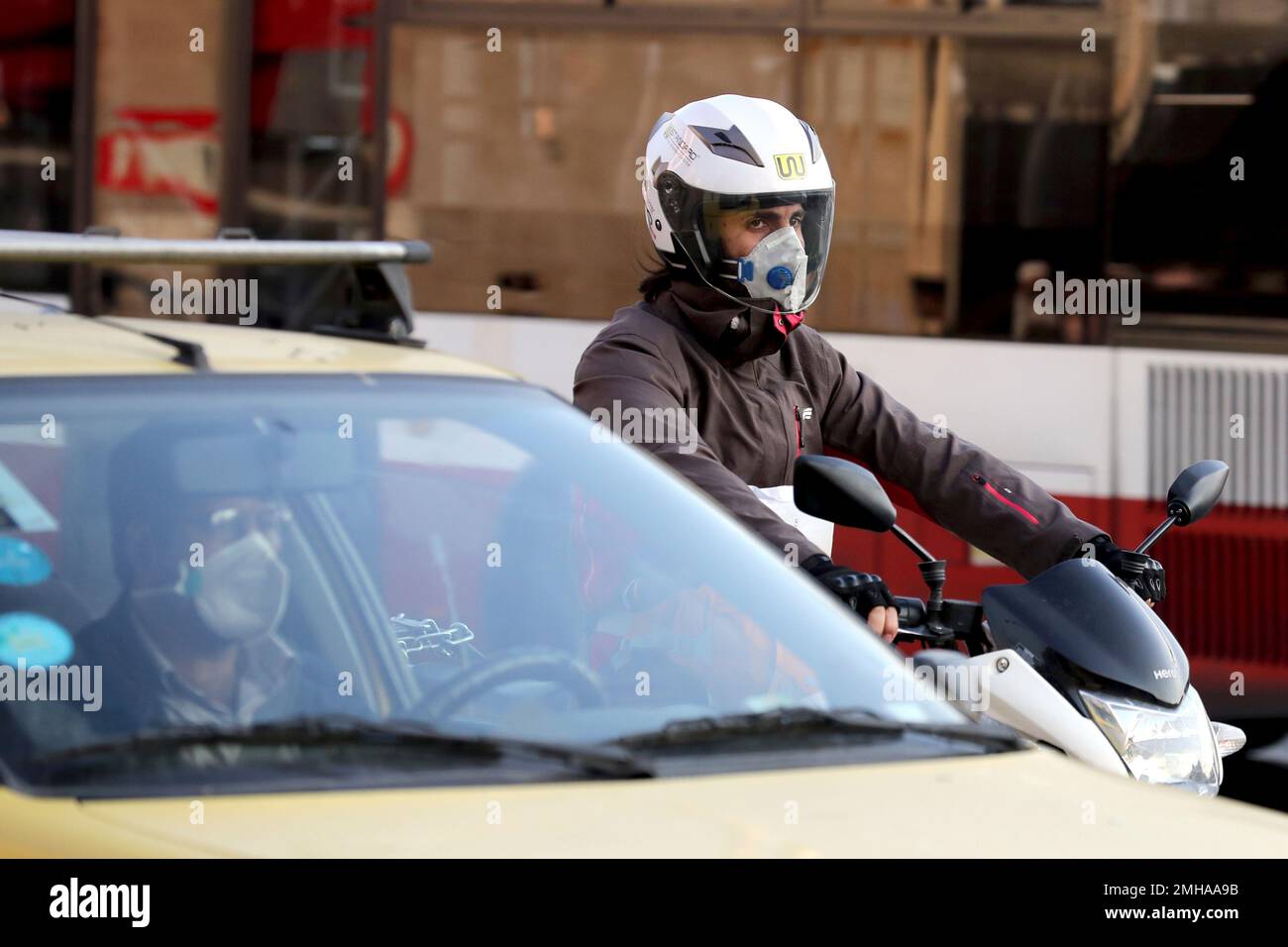 People wear masks to help guard against dangerous levels of air ...