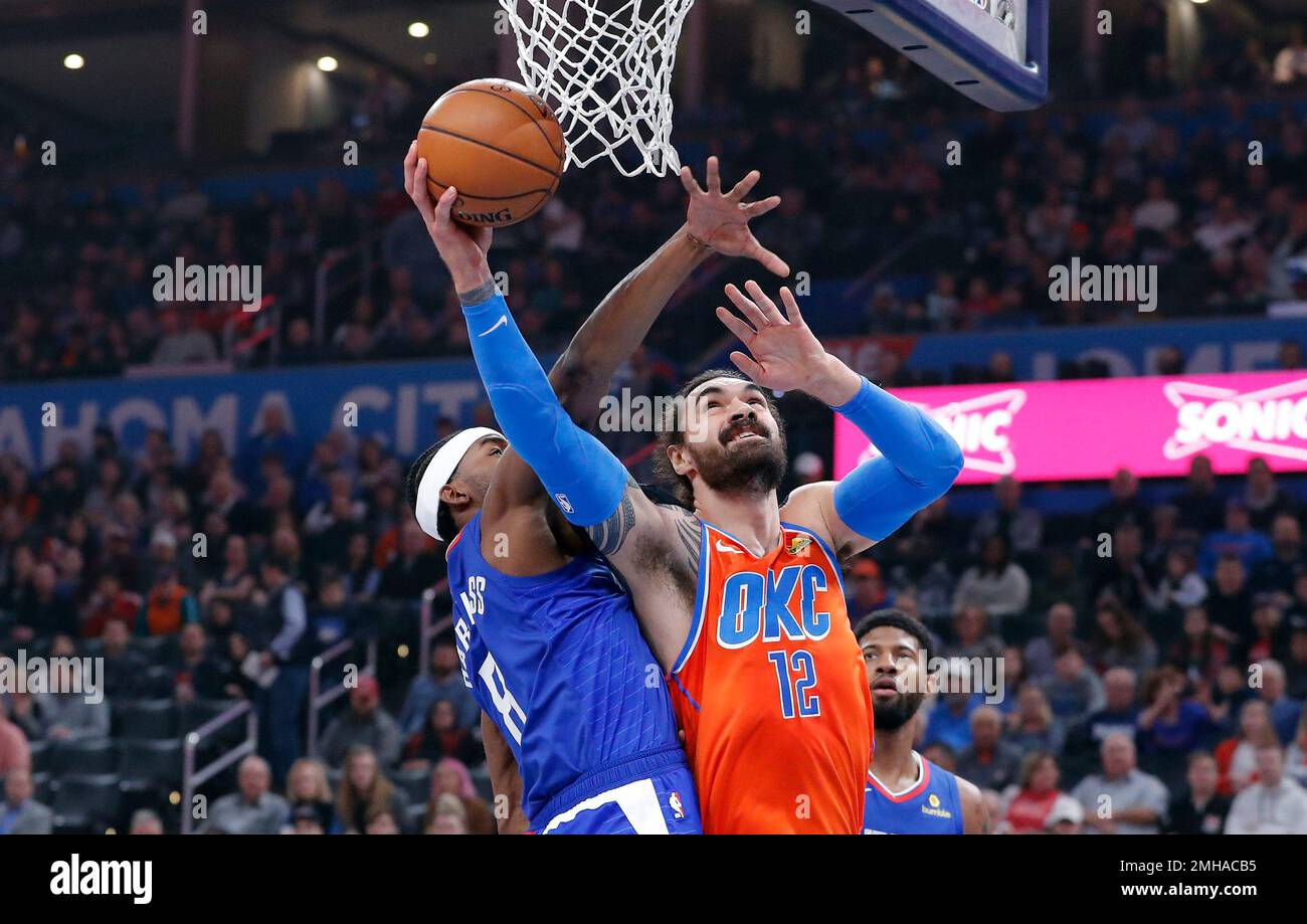 Oklahoma City Thunder center Steven Adams (12) goes up for a basket as ...