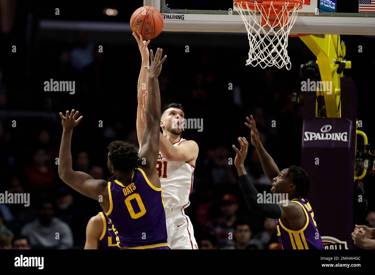 Southern California forward Nick Rakocevic, center, shoots against LSU ...