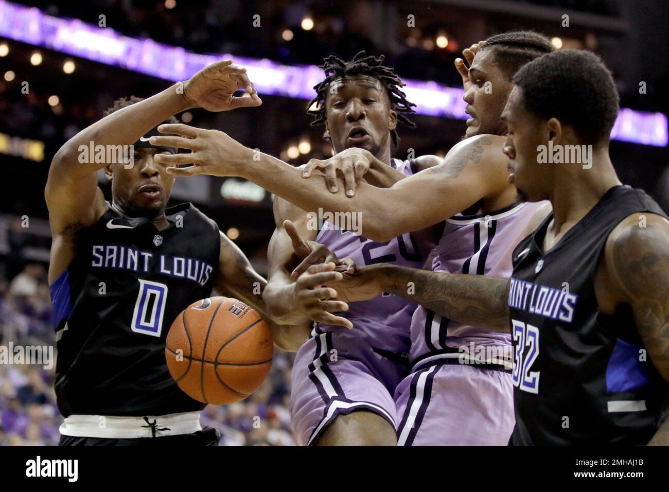 Saint Louis' Jordan Goodwin (0) and Jimmy Bell Jr. (32) battle with ...