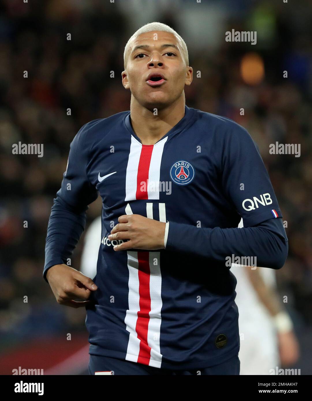 PSG's Kylian Mbappe reacts during the League One soccer match between ...