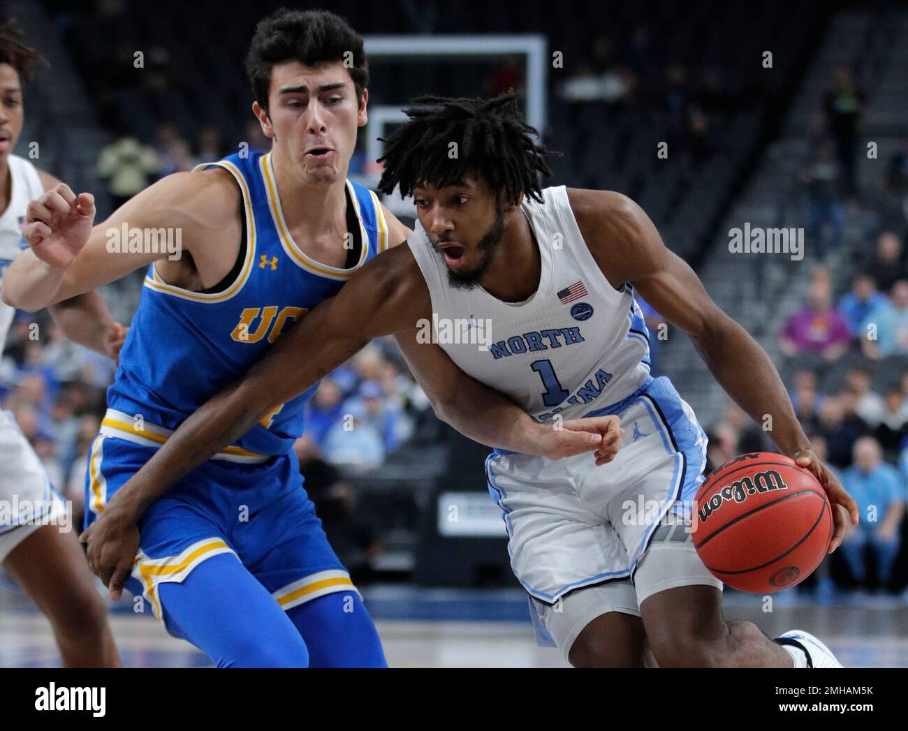 North Carolina's Leaky Black (1) drives into UCLA's Jaime Jaquez Jr. (4 ...