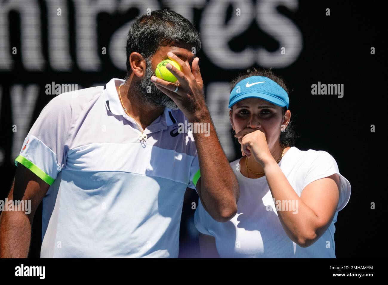 India's Rohan Bopanna and Sania Mirza talk during the mixed doubles ...