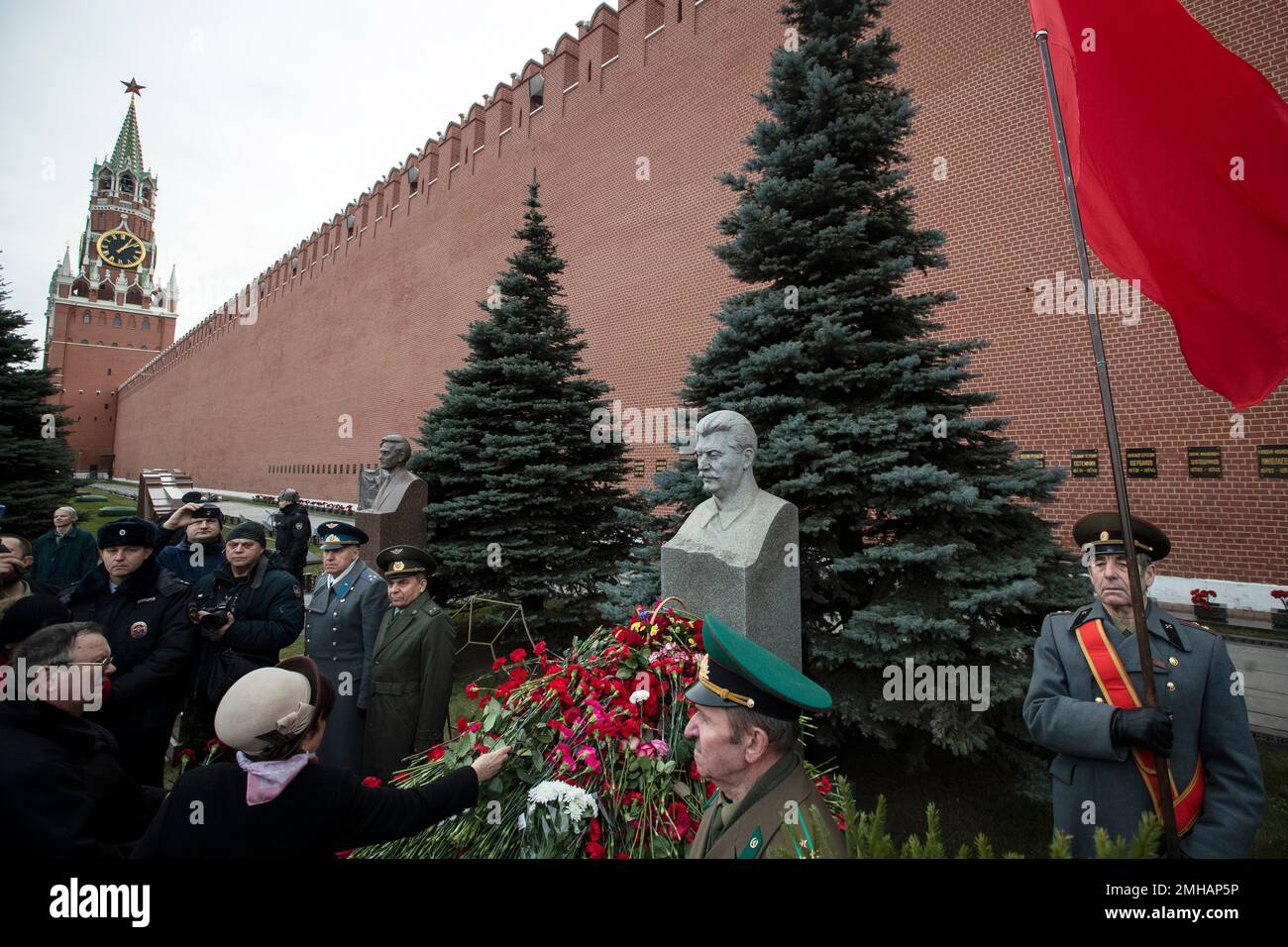 People lay flowers at the grave of Soviet leader Josef Stalin to mark ...