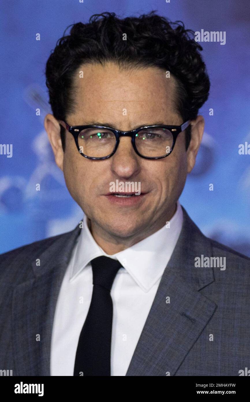J. J. Abrams poses for photographers upon arrival at the premiere for ...