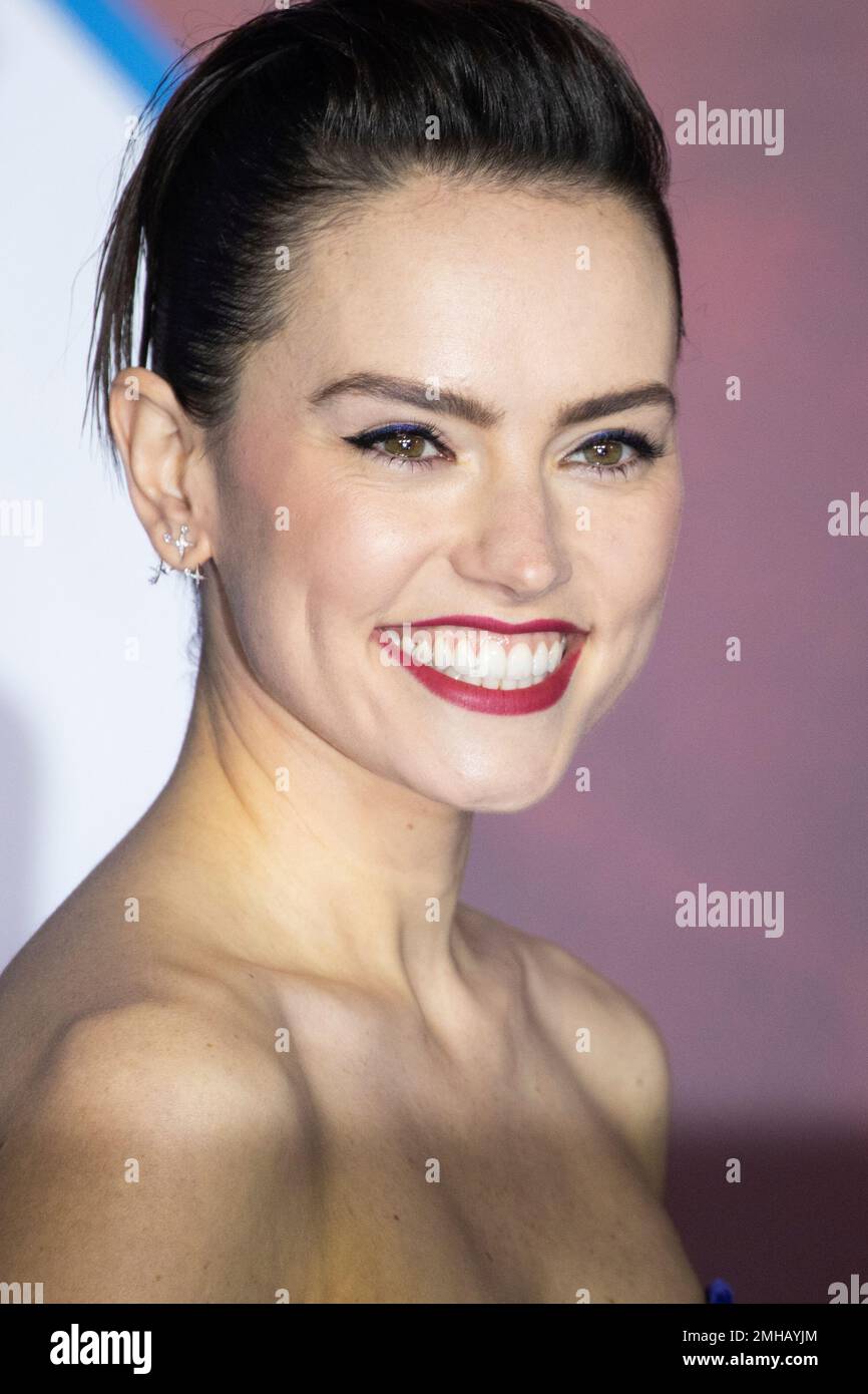 Actress Daisy Ridley poses for photographers upon arrival at the ...