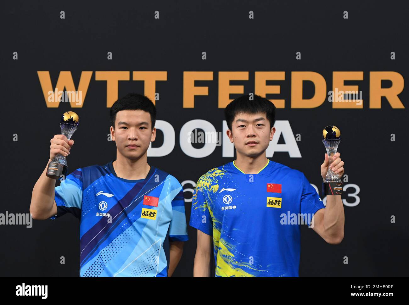 Doha, Qatar. 26th Jan, 2023. Yuan Licen (R)/Xiang Peng of China pose ...