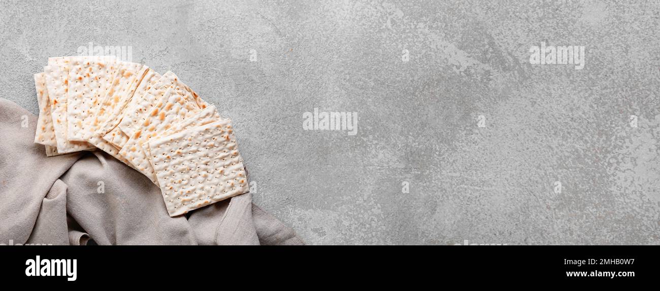 Jewish flatbread matza for Passover on grunge background with space for ...