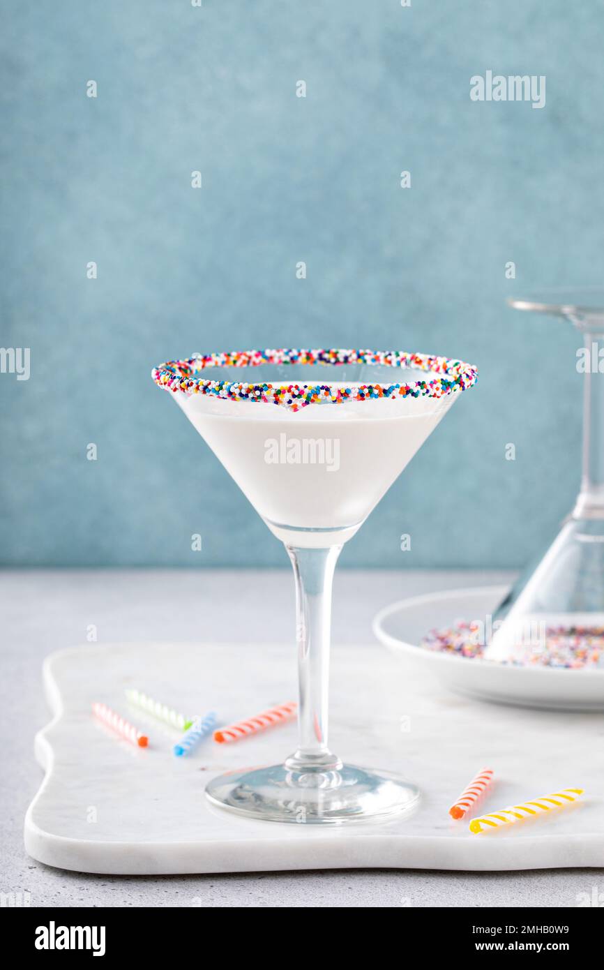 Birthday cake martini with sprinkles on rim Stock Photo - Alamy