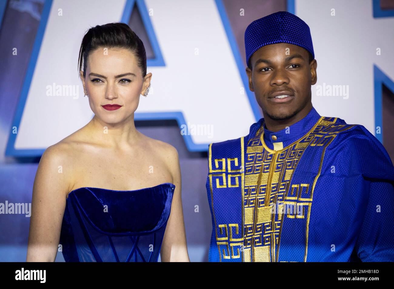 Actors Daisy Ridley and John Boyega pose for photographers upon arrival ...