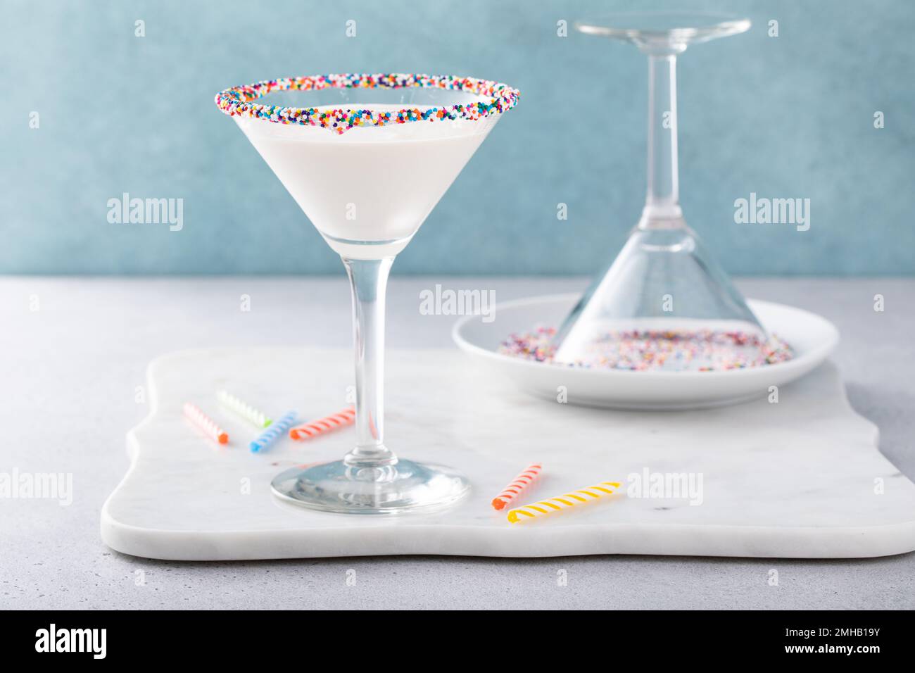 Birthday cake martini with sprinkles on rim Stock Photo - Alamy