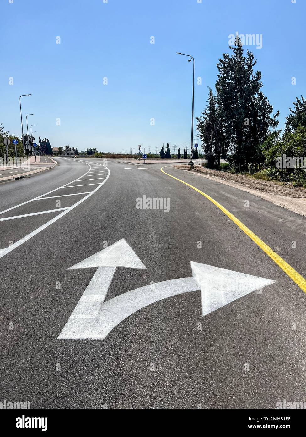 Road with direction marks in city Stock Photo - Alamy