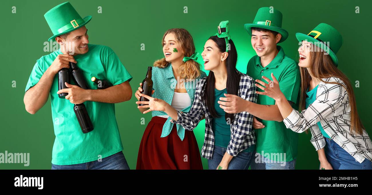 Friends with beer on green background. St. Patrick's Day celebration ...