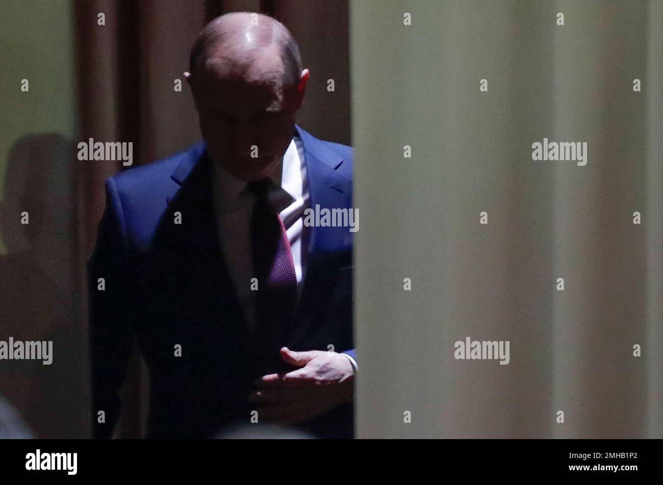 Russian President Vladimir Putin arrives for his annual news conference ...