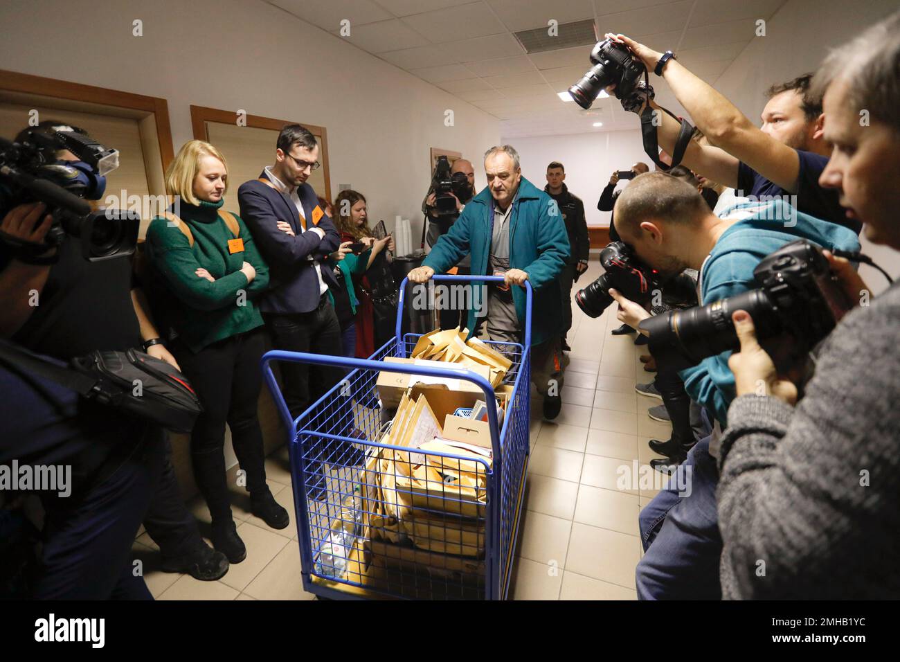 Evidence is brought to a courtroom in Pezinok, Slovakia, Thursday, Dec ...