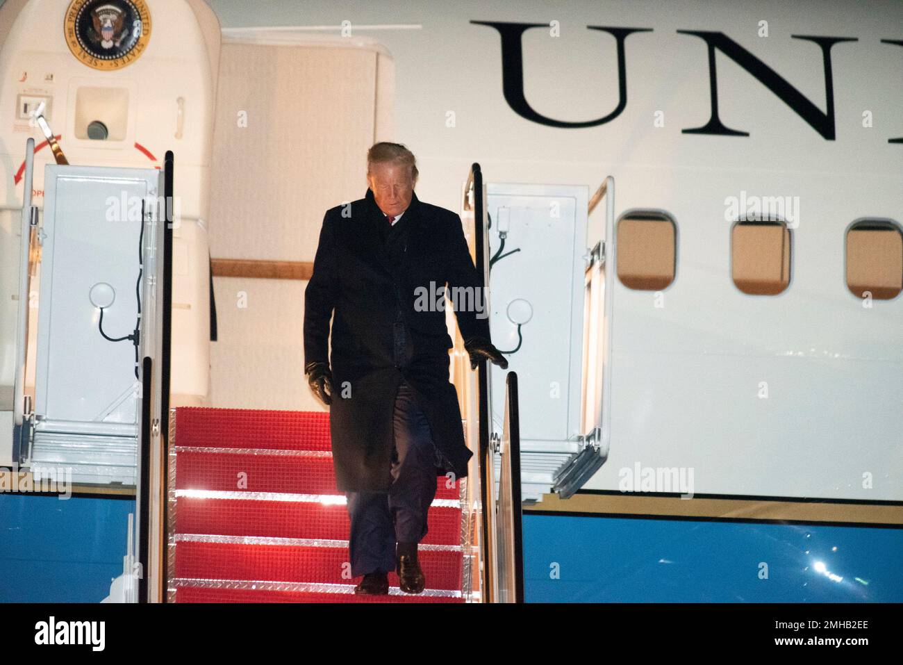 President Donald Trump exits Air Force One on Wednesday, Dec. 18, 2019 ...