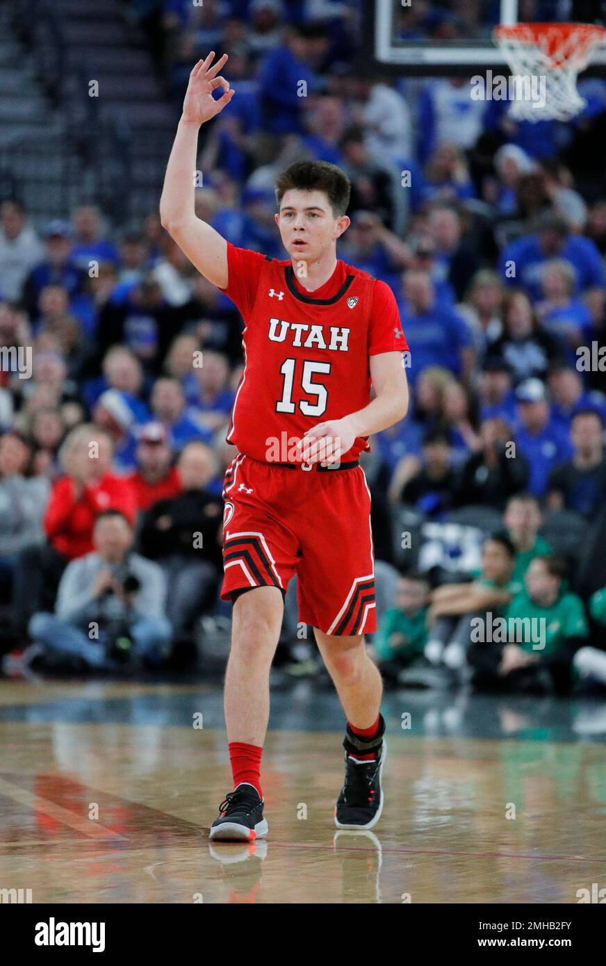 Utah's Rylan Jones (15) gestures after making a 3-point shot against ...