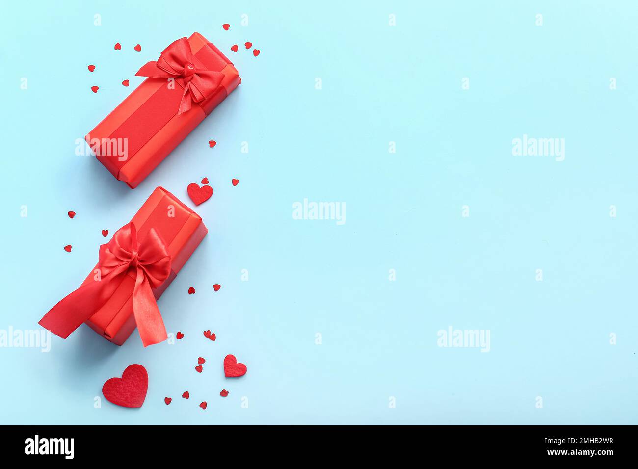 Gift boxes and decor on color background. Valentine's Day celebration ...