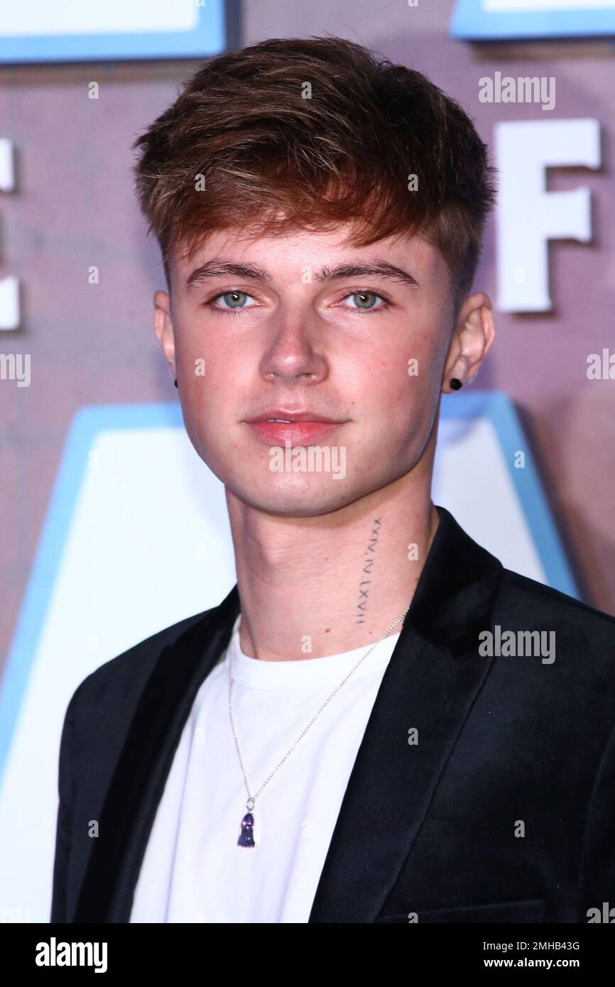 HRVY poses for photographers upon arrival at the premiere for the film ...