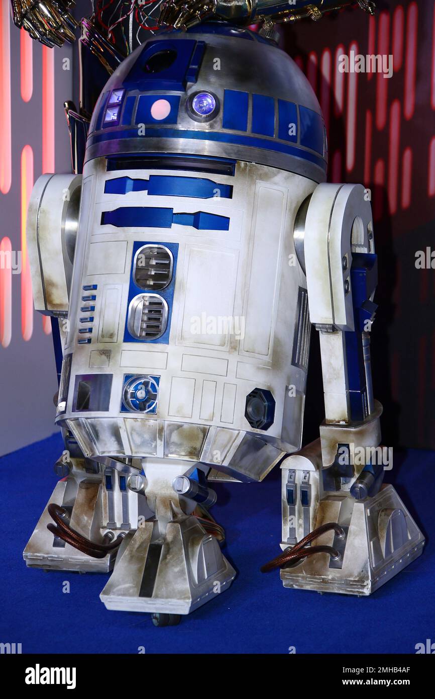 R2D2 poses for photographers upon arrival at the premiere for the film ...