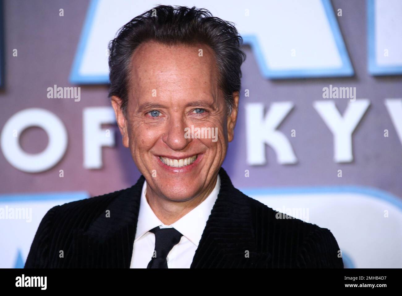 Actor Richard E. Grant poses for photographers upon arrival at the ...