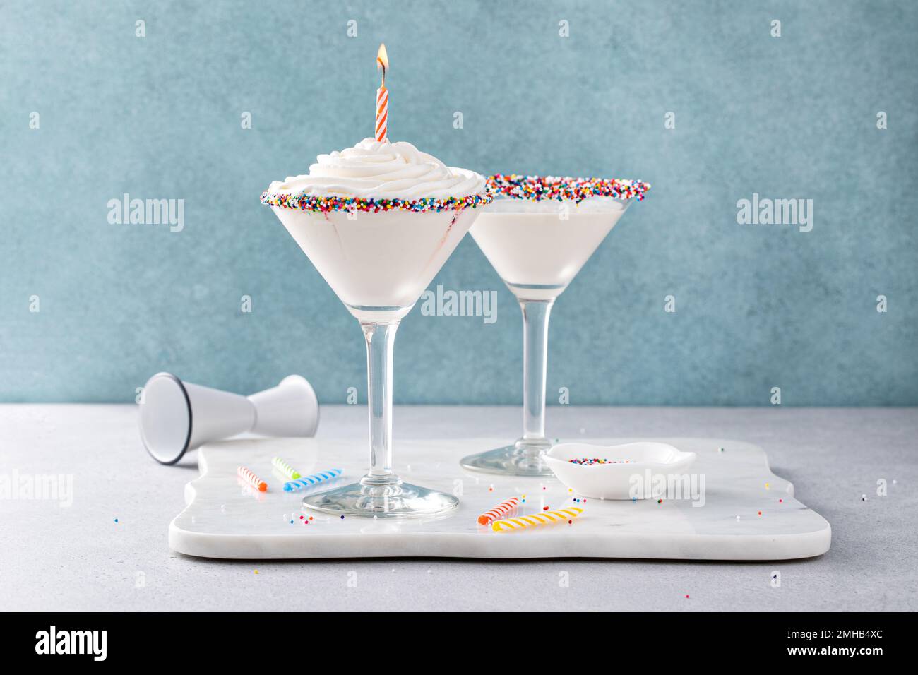 Birthday cake martini with sprinkles on rim Stock Photo - Alamy